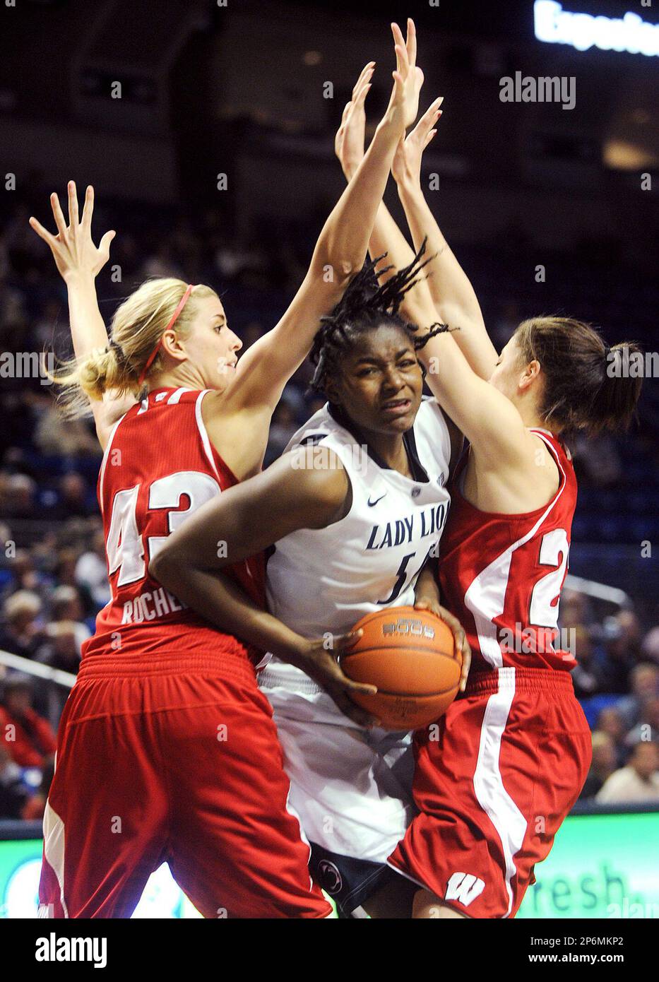 Penn State's Nikki Greene pushes between Wisconsin's Cassie Rochel ...