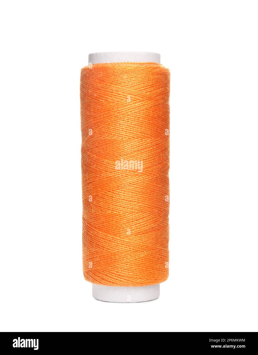 Spool of orange sewing thread isolated on white Stock Photo - Alamy