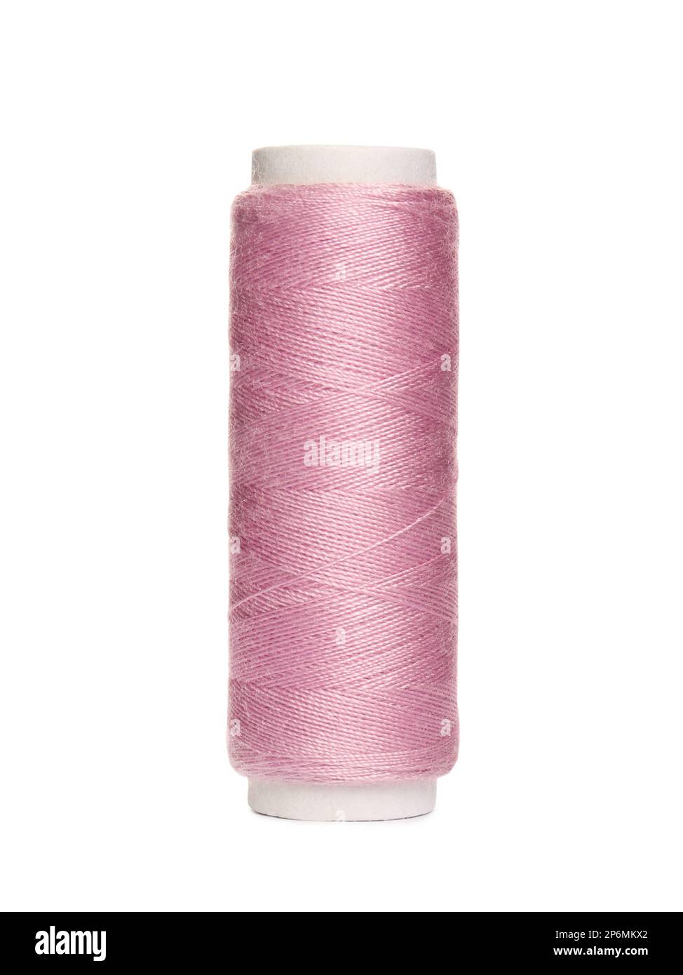 Spool of pink sewing thread isolated on white Stock Photo - Alamy