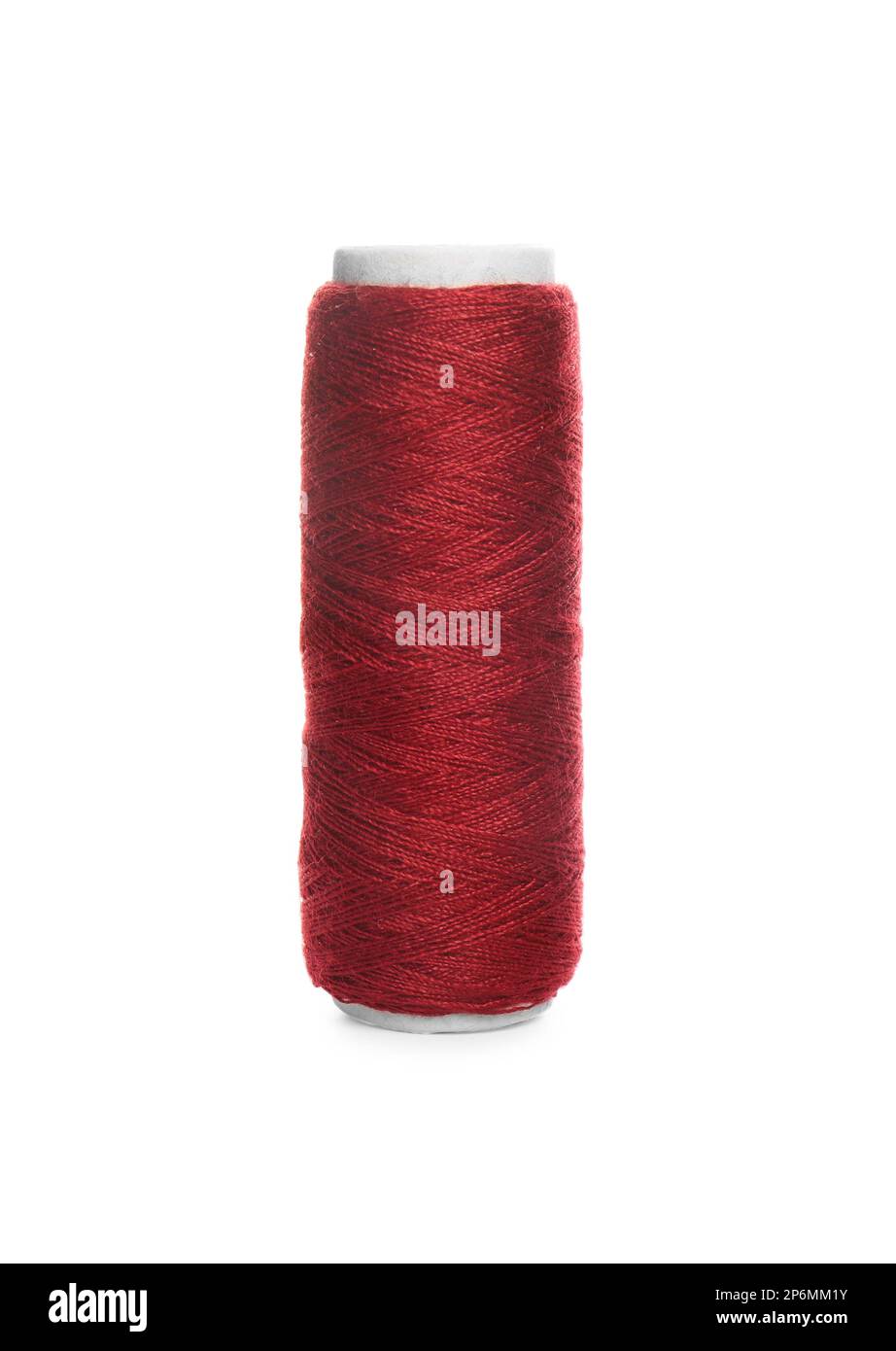 Spool of dark red sewing thread isolated on white Stock Photo - Alamy