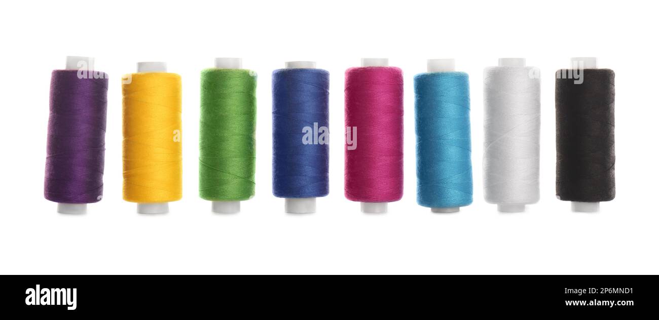 Set of colorful sewing threads on white background Stock Photo - Alamy