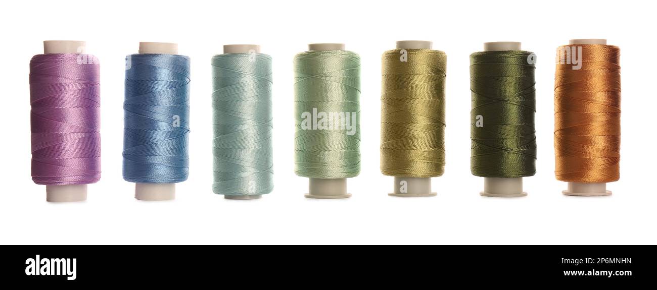 Set of colorful sewing threads on white background Stock Photo - Alamy