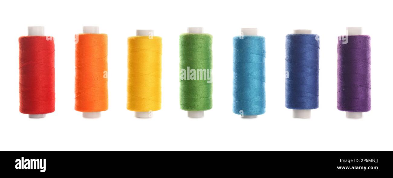 Set of colorful sewing threads on white background Stock Photo - Alamy