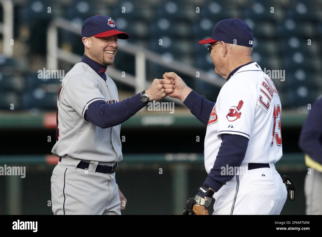 Former major league pitcher Brian Anderson fist bumps a camper during ...