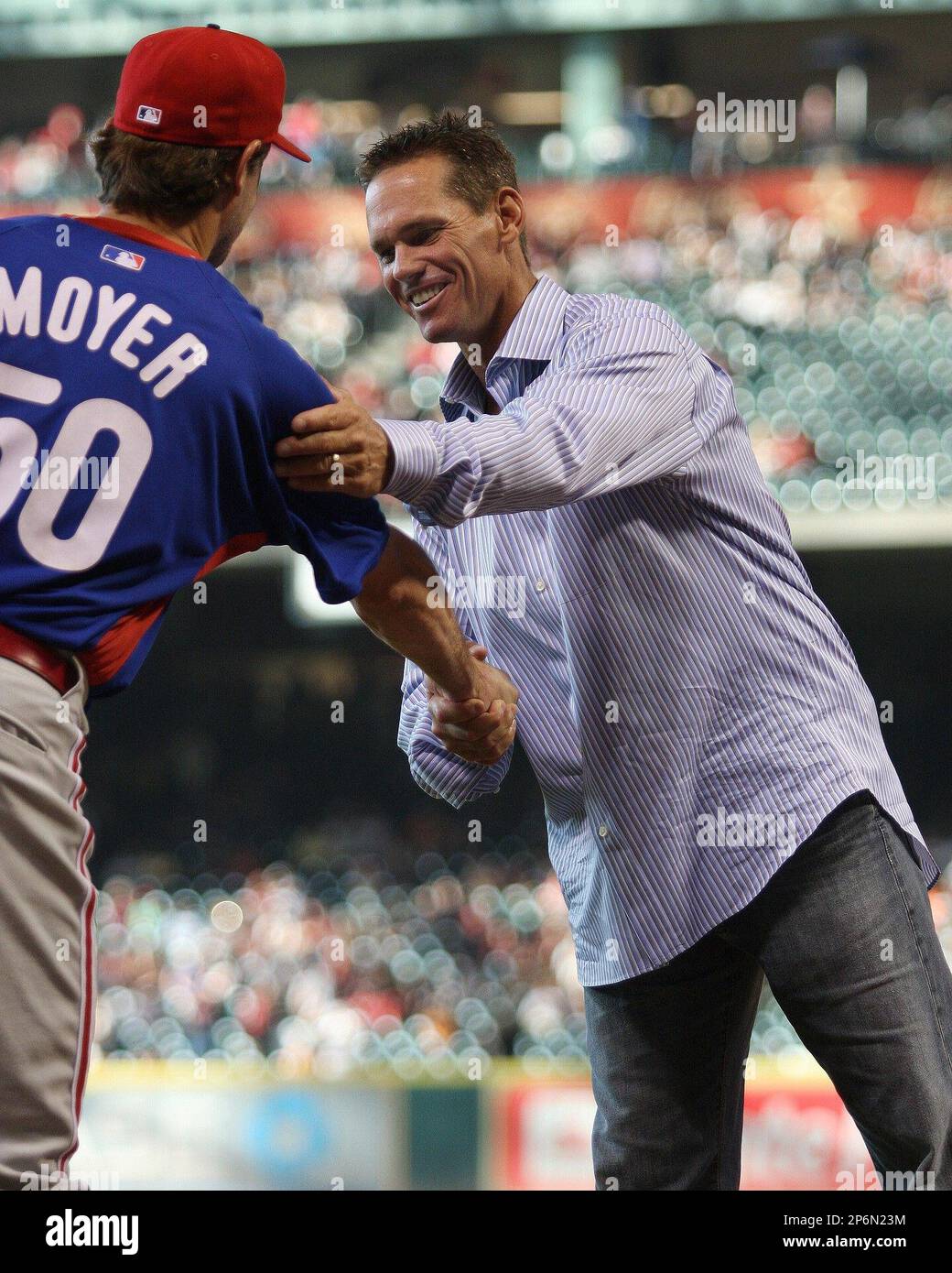 Former Astros star Craig Biggio greets Phillies pitcher Jamie Moyer on ...