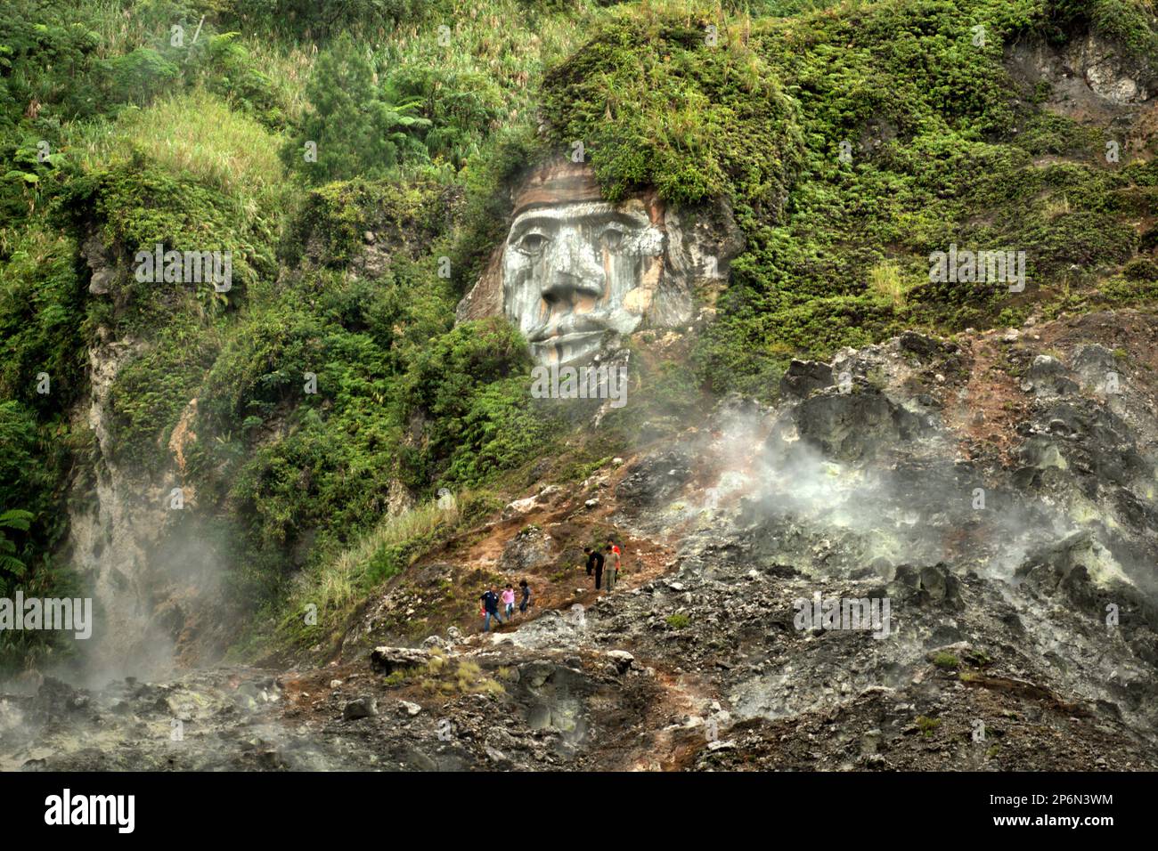 Visitors are having recreational time on fumarole field, in a ...