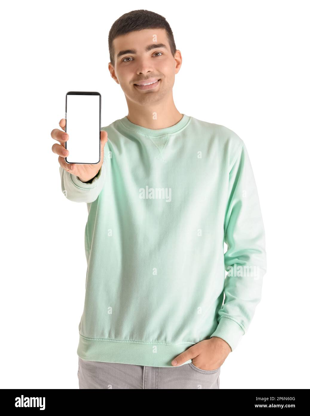 Handsome guy with mobile phone on white background Stock Photo - Alamy