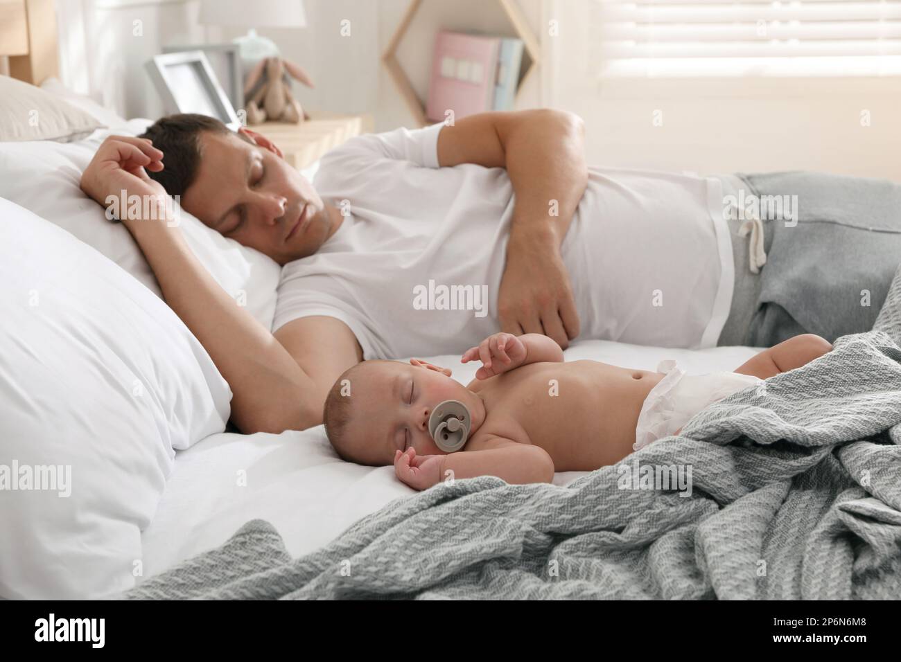 Father And Baby Sleeping