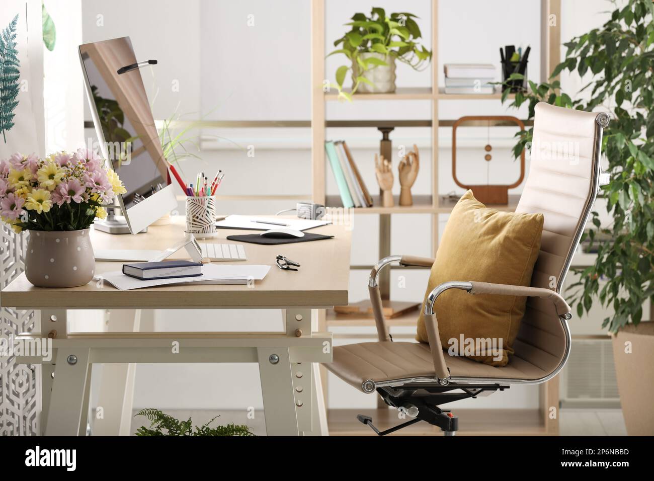 Comfortable workplace with modern computer and stylish furniture in ...