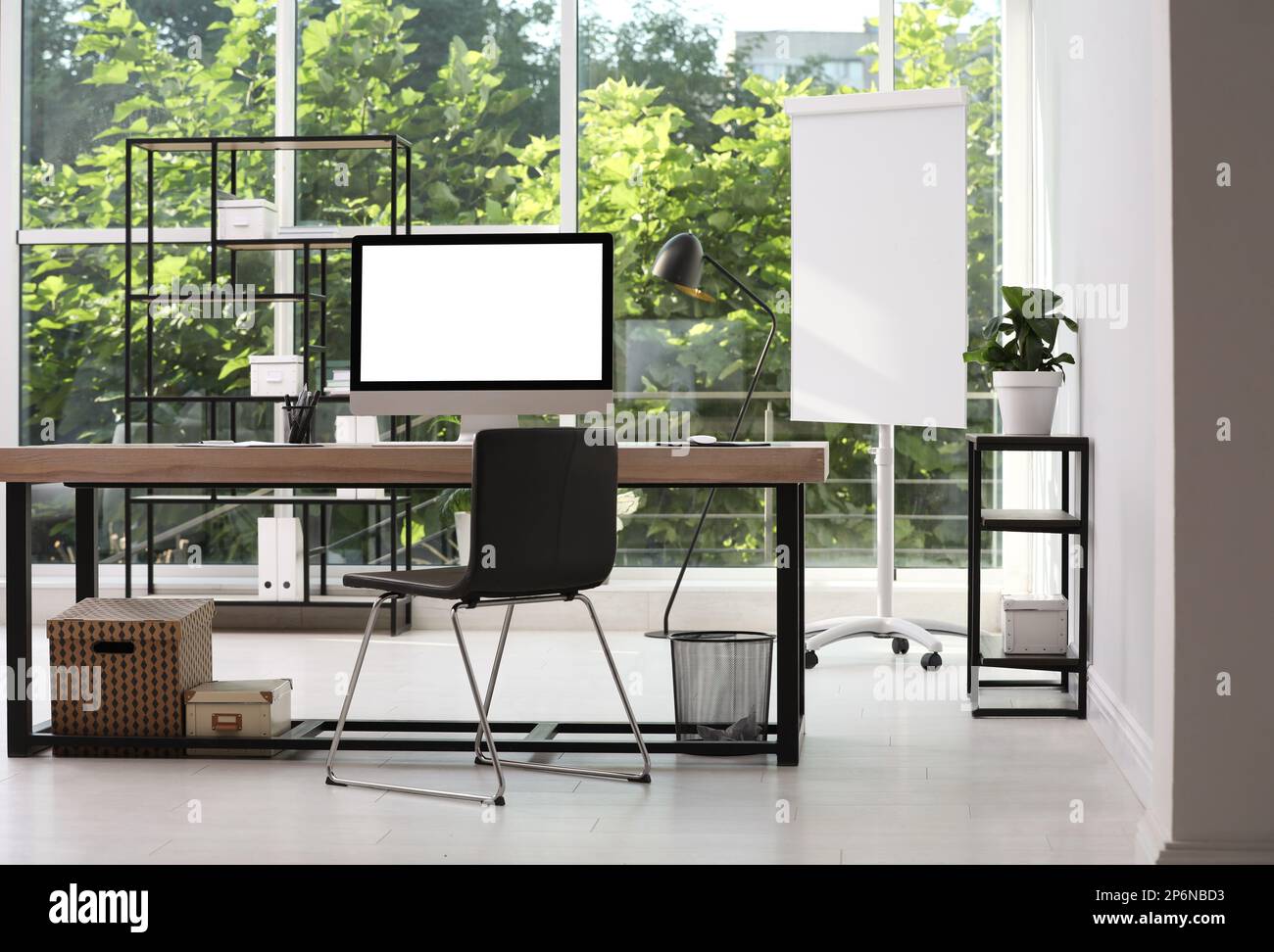 Comfortable workplace with modern computer and stylish furniture in ...