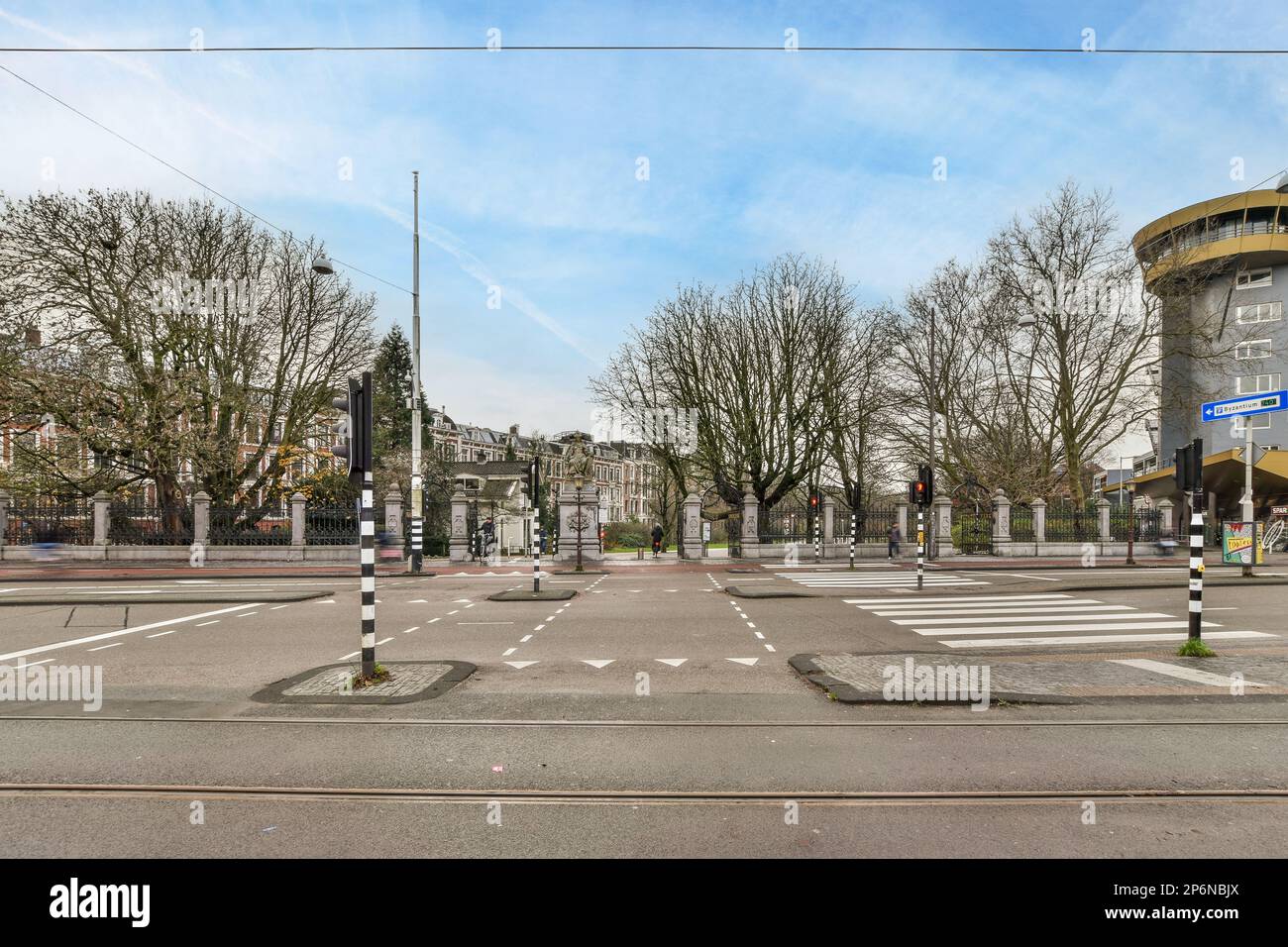 an empty street in the middle of town with no cars or people on it, and ...