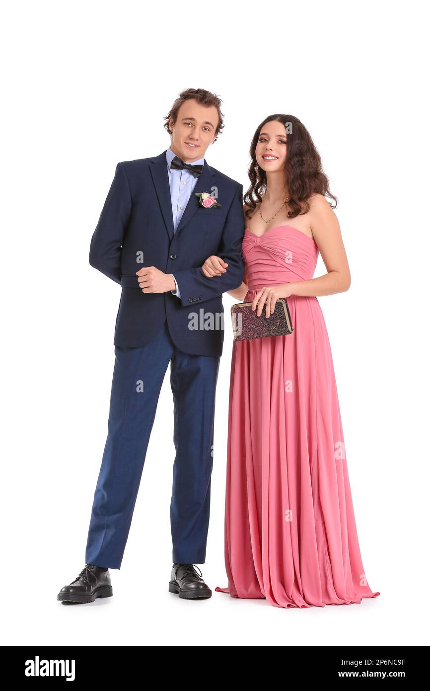 Beautiful couple dressed for prom on white background Stock Photo - Alamy
