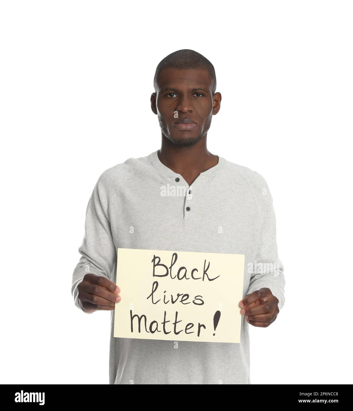 African American man holding sign with phrase Black Lives Matter on ...