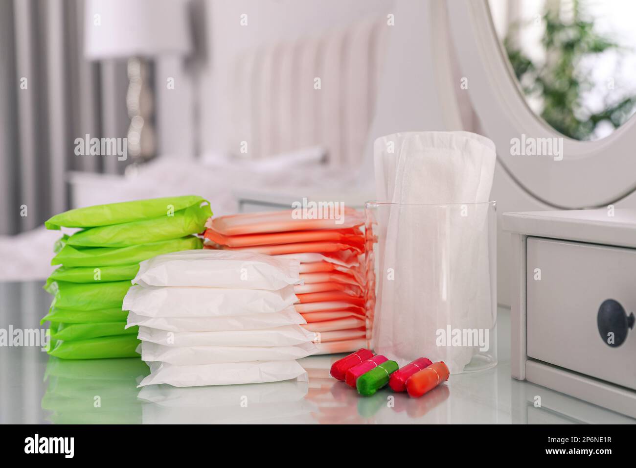 Different feminine hygiene products on dressing table in bedroom Stock ...