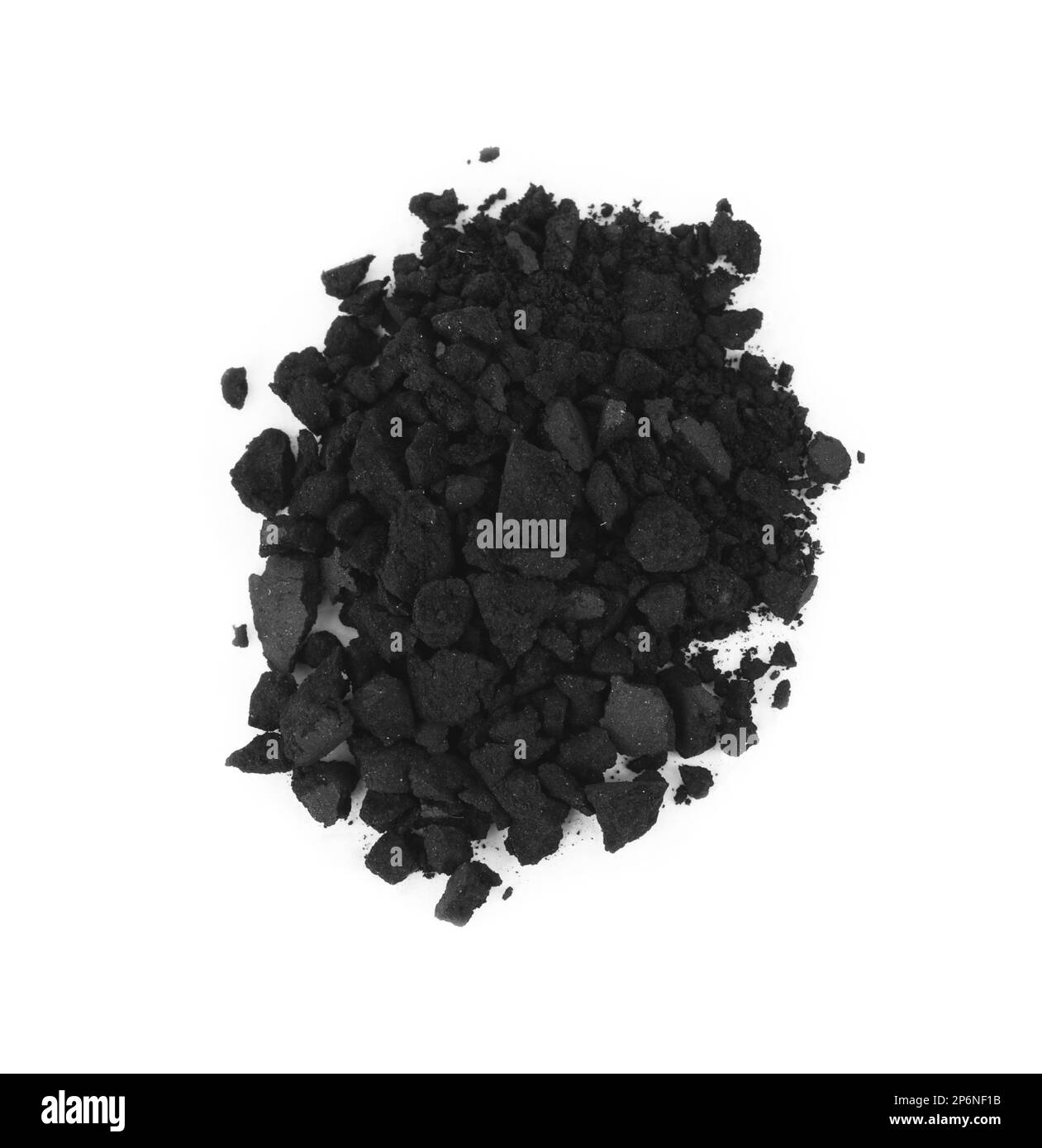 Pile of crushed activated charcoal pills on white background, top view ...