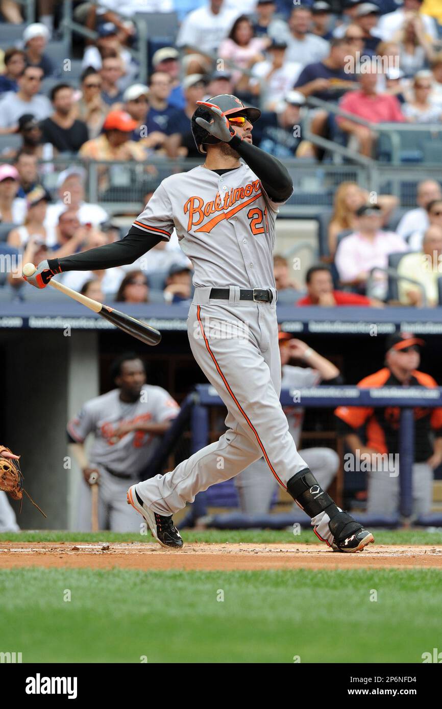 Baltimore Orioles outfielder Nick Markakis #21 hits a home run during ...