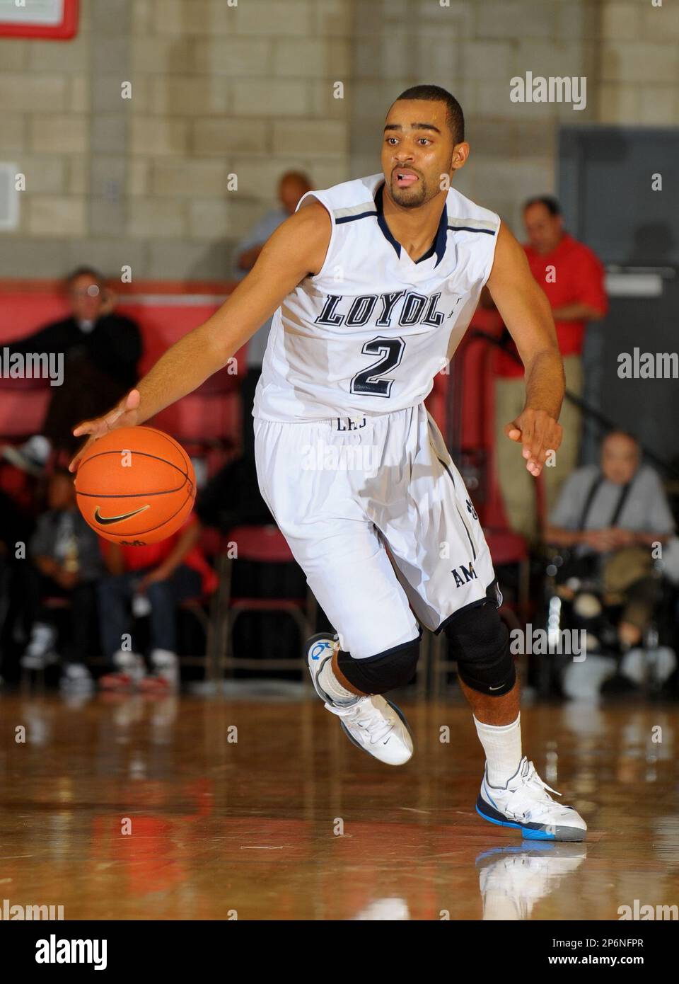 February 4, 2012 Santa Ana, CA. Loyola Cubs Julian Harrell #2 in action ...