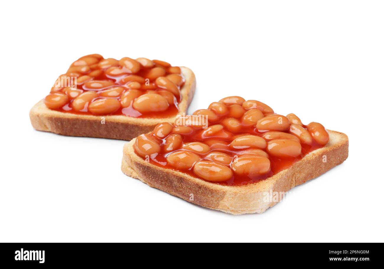 Delicious bread slices with baked beans on white background Stock Photo ...