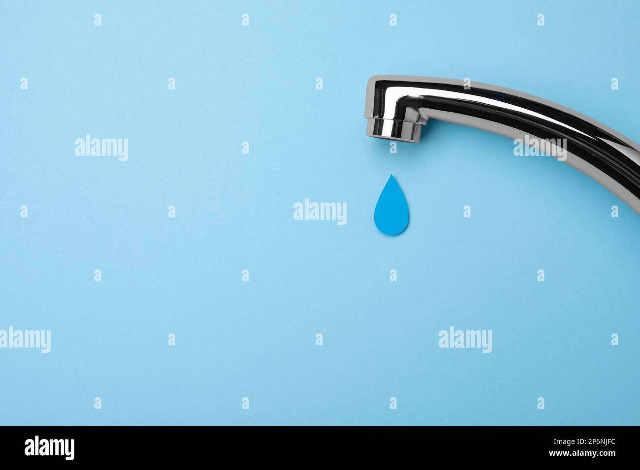 Paper water drop and modern tap on light blue background, flat lay ...