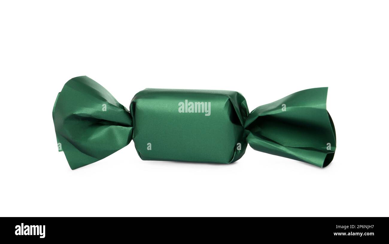 Delicious candy in dark green wrapper isolated on white Stock Photo - Alamy