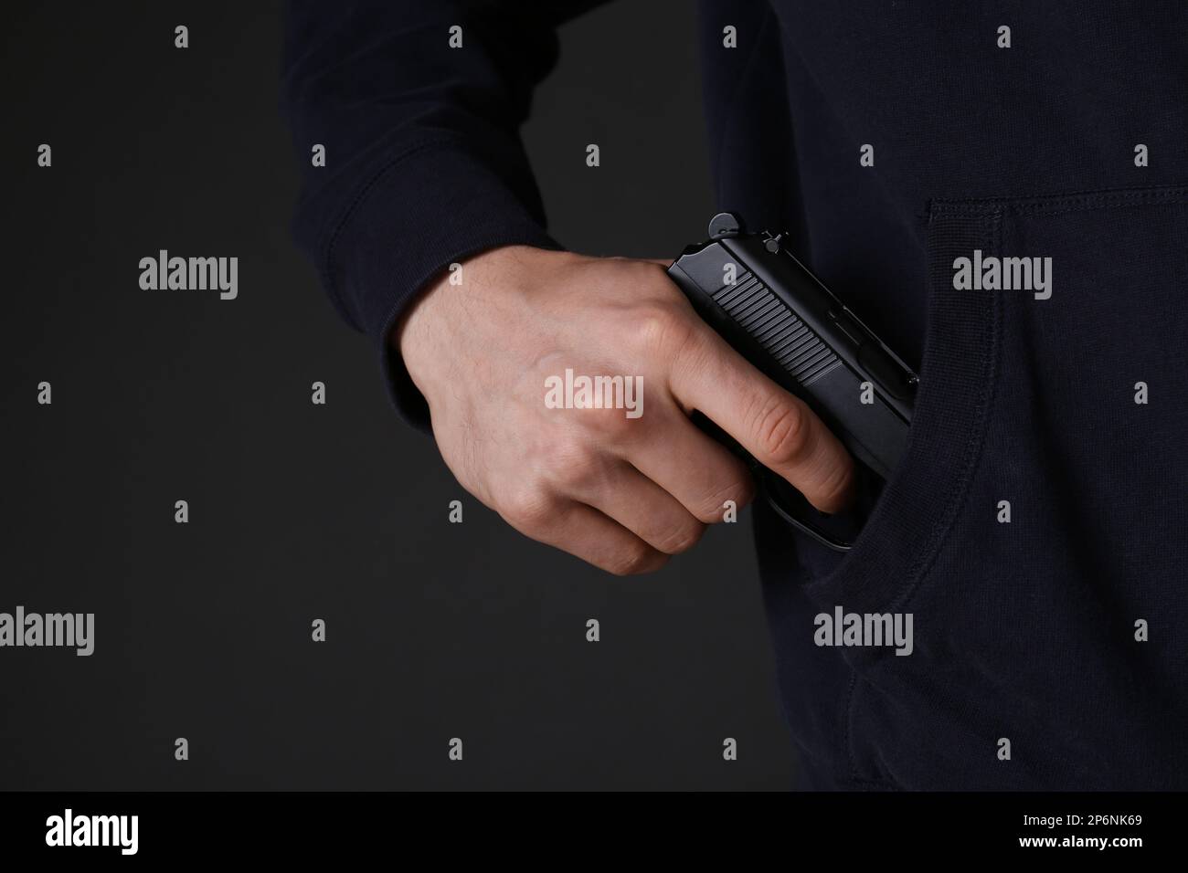 Gun in pocket hi-res stock photography and images - Alamy