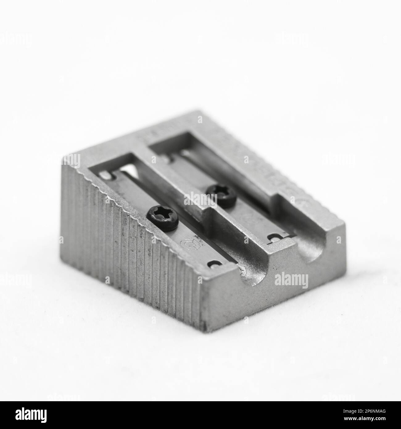 a clean twin pencil sharpener made of stainless steel isolated in a ...