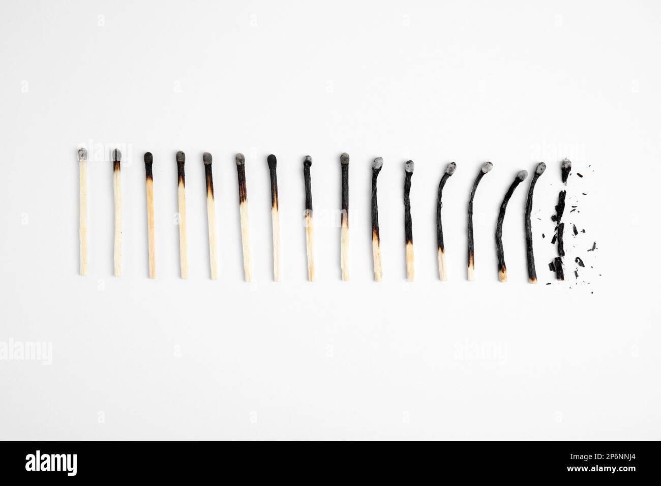 Different stages of burnt matches on white background, flat lay Stock ...