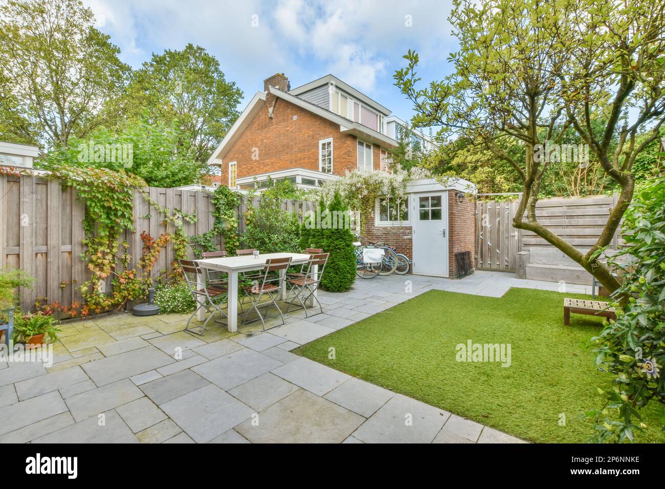 Amsterdam, Netherlands - 10 April, 2021: a backyard area with a table ...