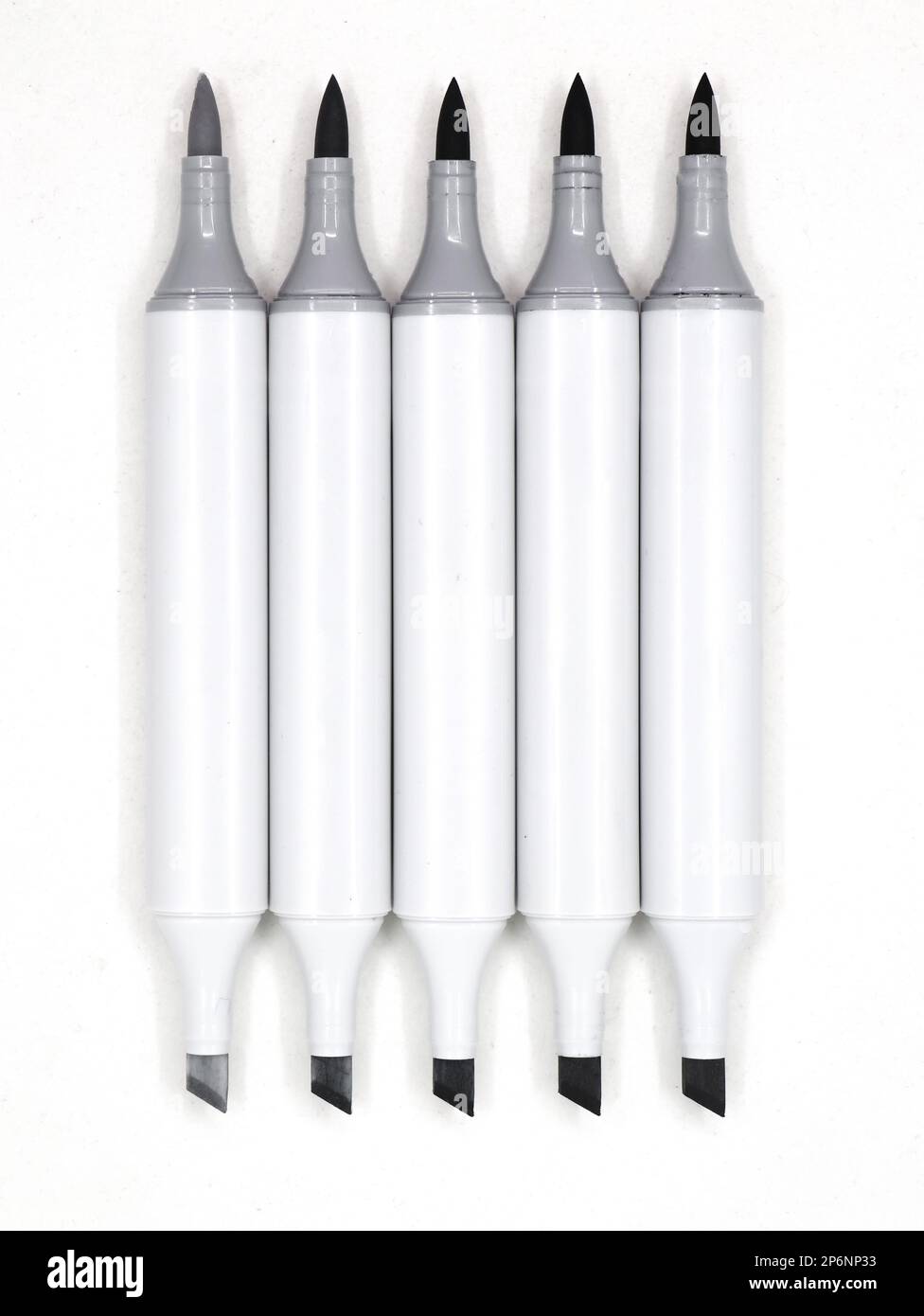 set of gray sketch pens or markers with open tips used by designers ...