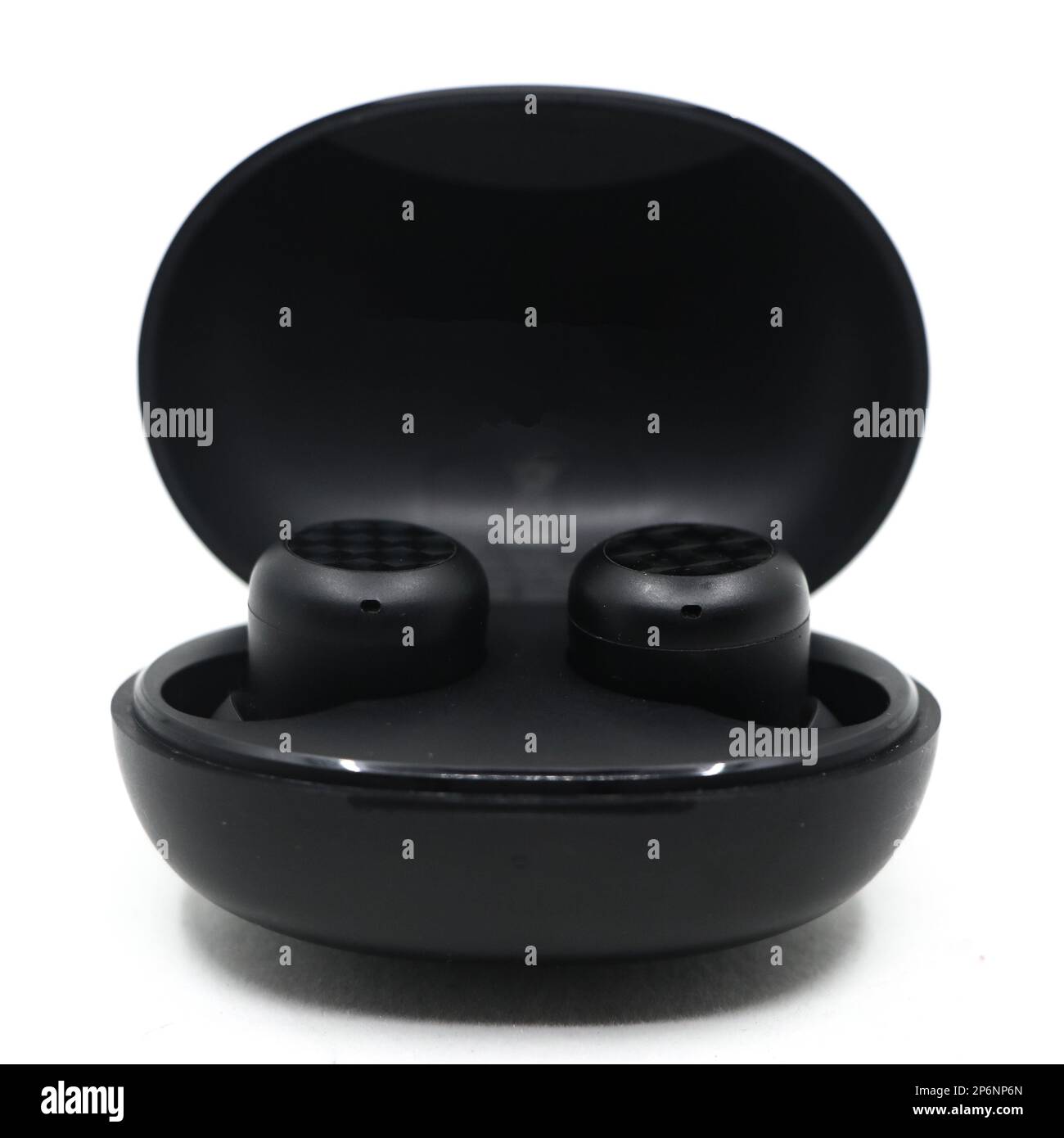 black wireless noise cancelling earbuds head set with a charging power ...