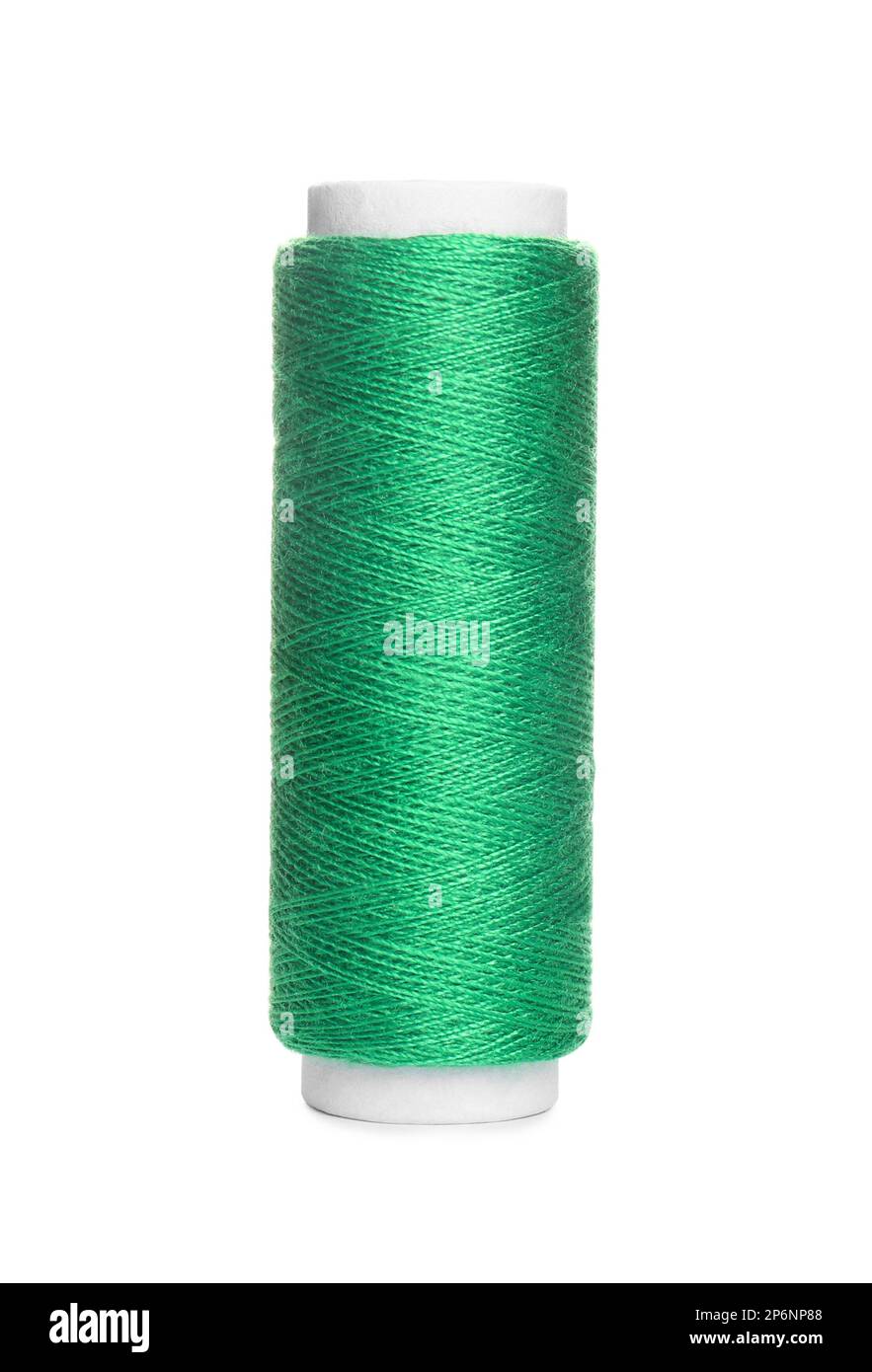 Spool of green sewing thread isolated on white Stock Photo - Alamy
