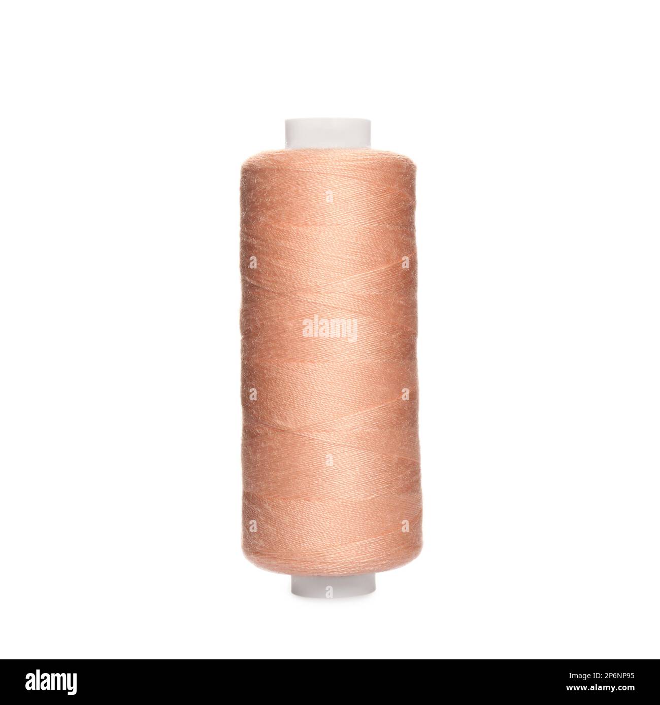 Spool of pale pink sewing thread isolated on white Stock Photo - Alamy