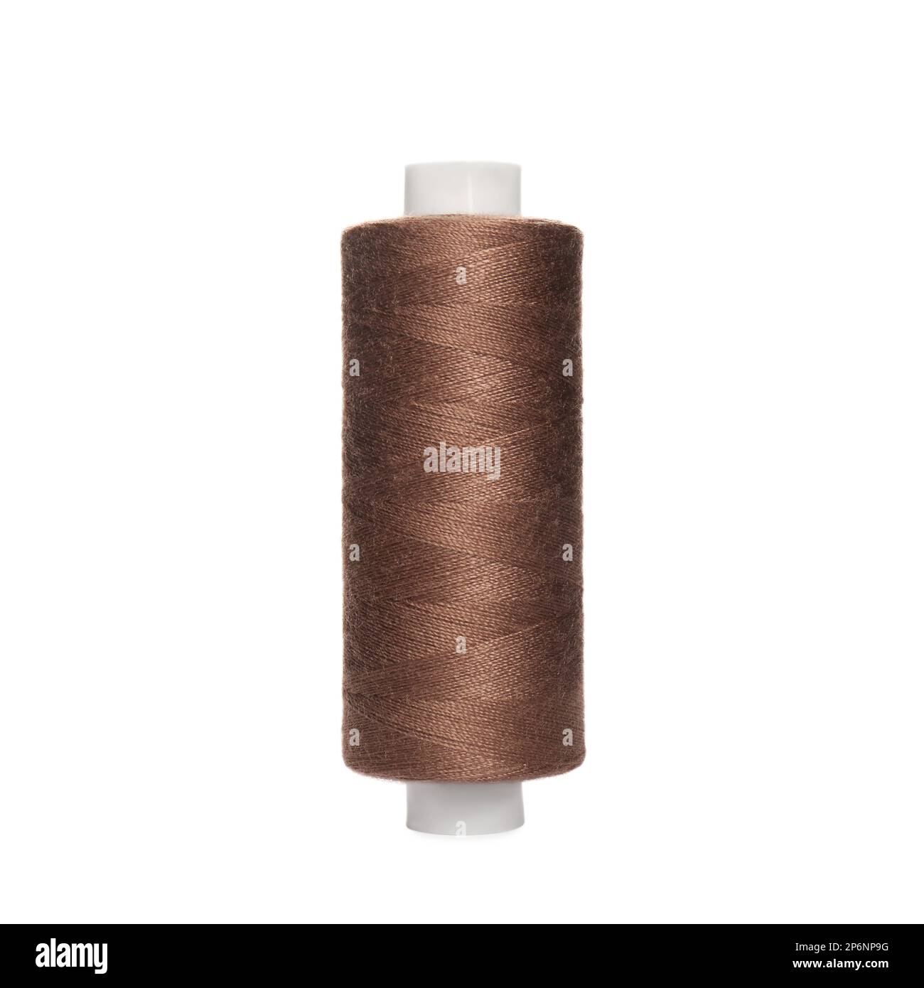 Spool of brown sewing thread isolated on white Stock Photo - Alamy