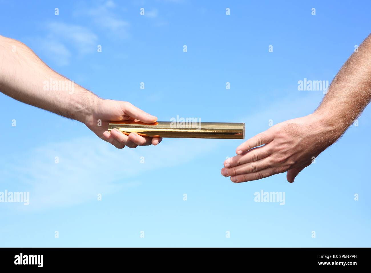 Hands baton sky hi-res stock photography and images - Alamy