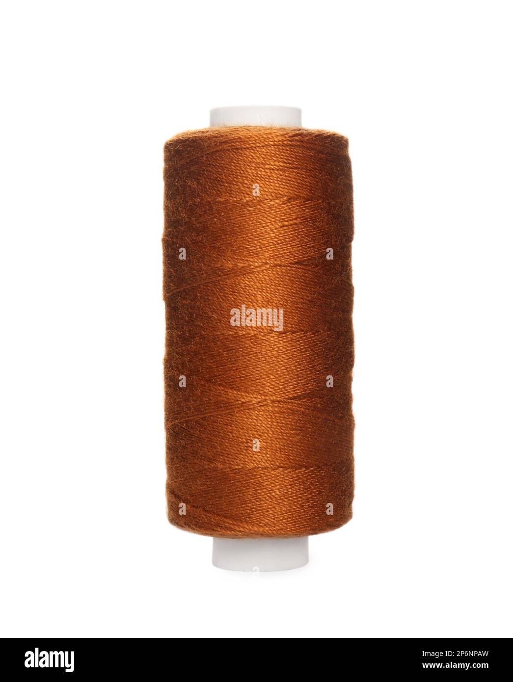 Spool of dark orange sewing thread isolated on white Stock Photo - Alamy