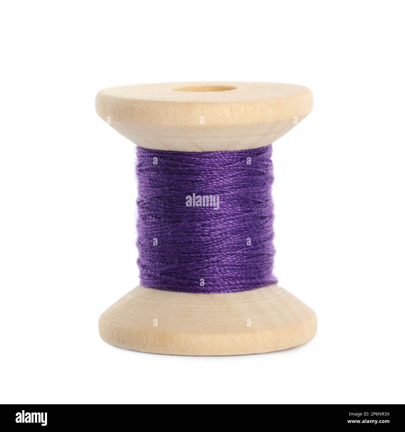 Wooden spool of purple sewing thread isolated on white Stock Photo - Alamy