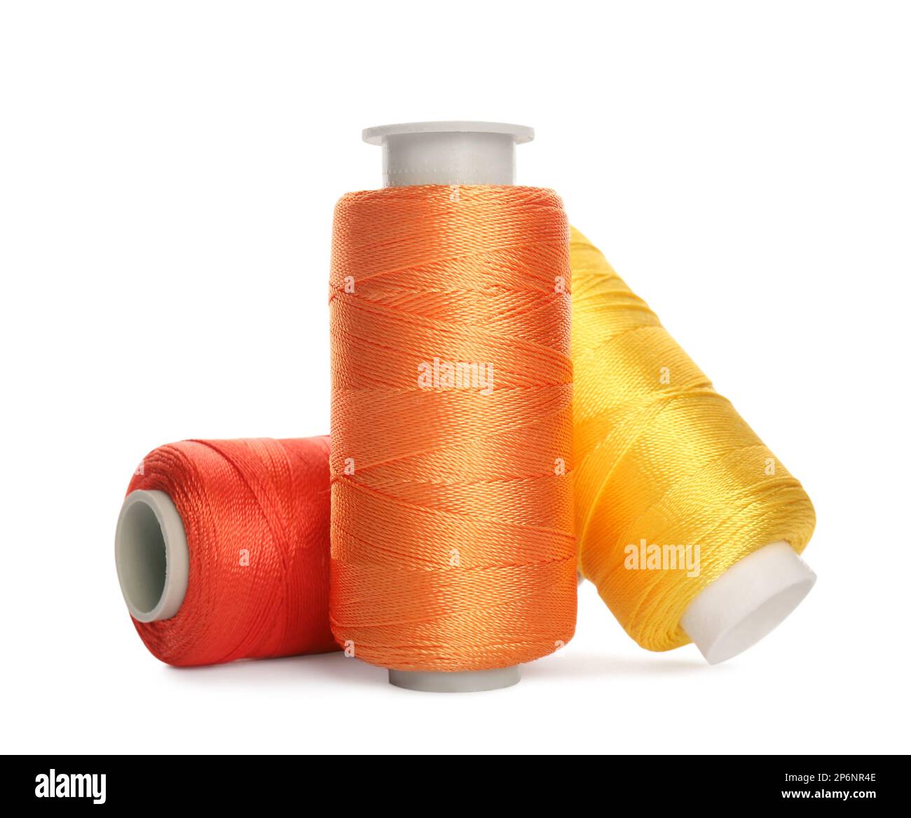 Different colorful sewing threads on white background Stock Photo - Alamy