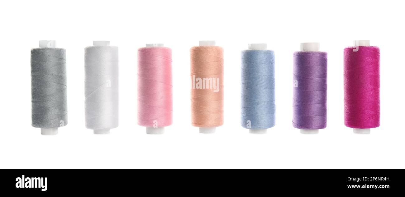 Set of colorful sewing threads on white background Stock Photo - Alamy