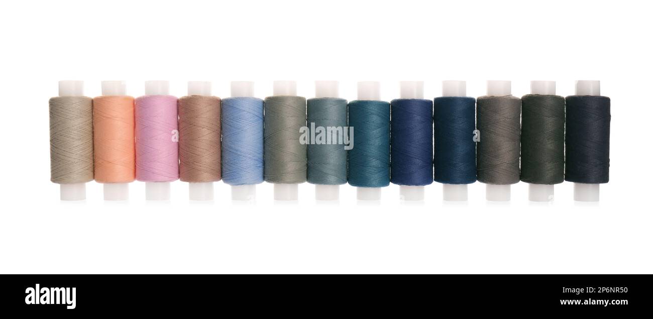 Set of colorful sewing threads on white background Stock Photo - Alamy