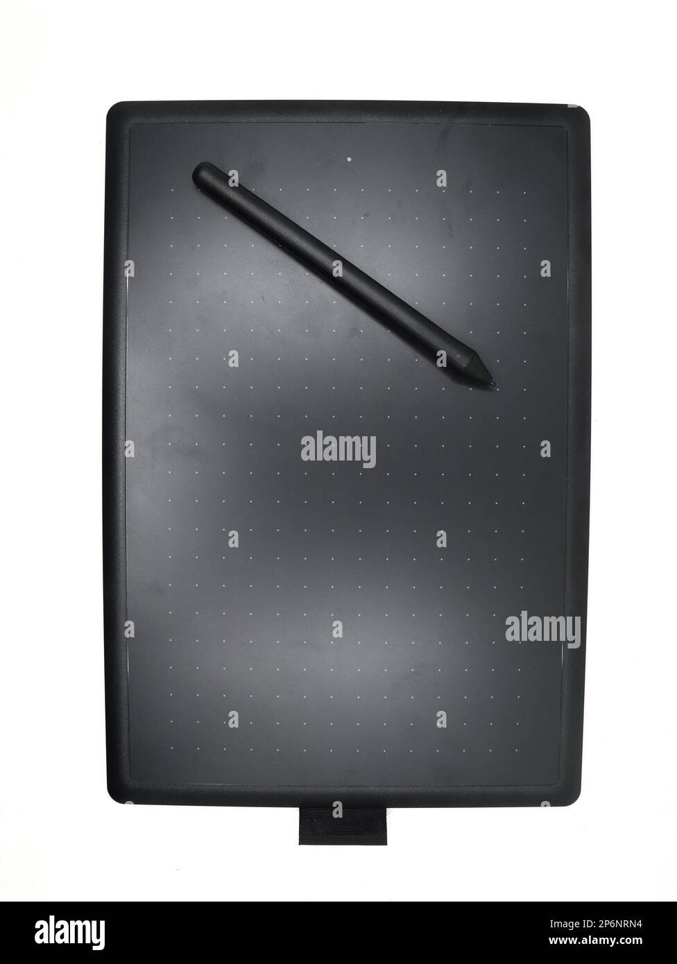 a black digital sketching tablet for artists and designers with a pen ...