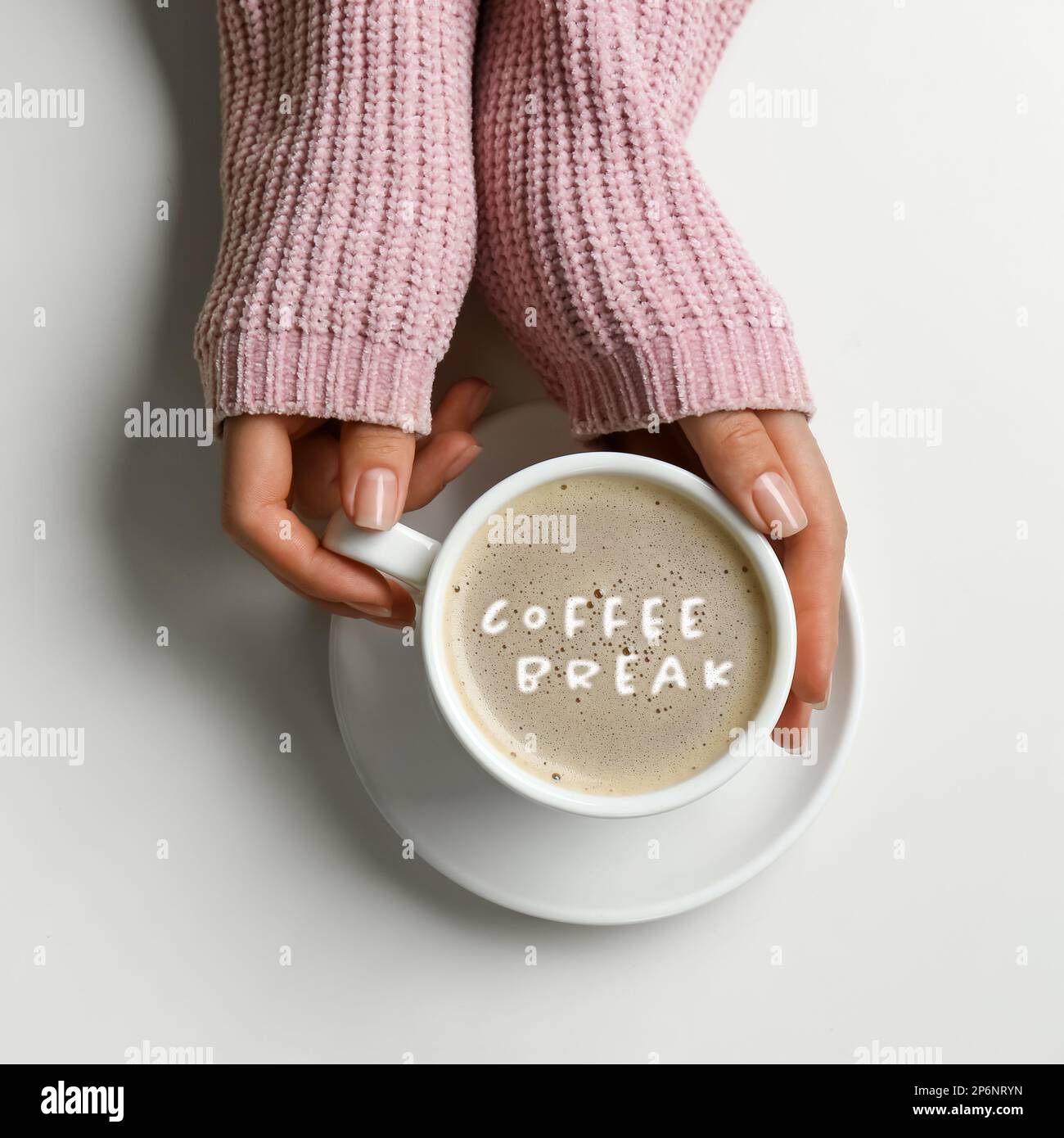 Coffee Break. Woman with cup of americano at white table, top view ...