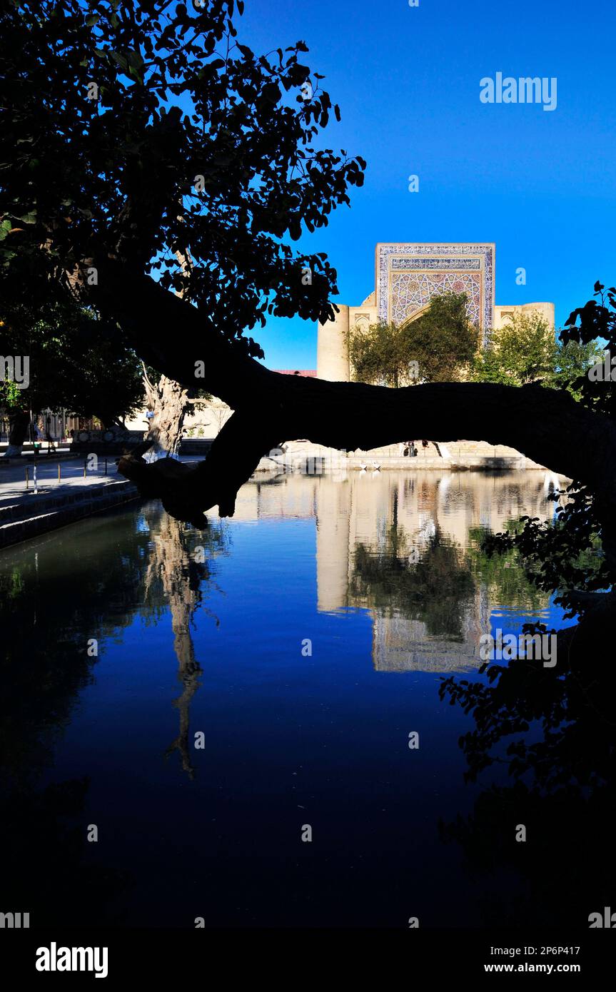 The Nodir Devonbegi Madrasah and the Divan-Beghi pond in the heart of ...