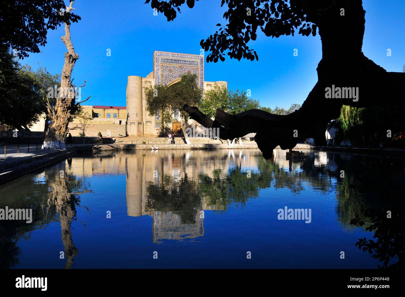 The Nodir Devonbegi Madrasah and the Divan-Beghi pond in the heart of ...