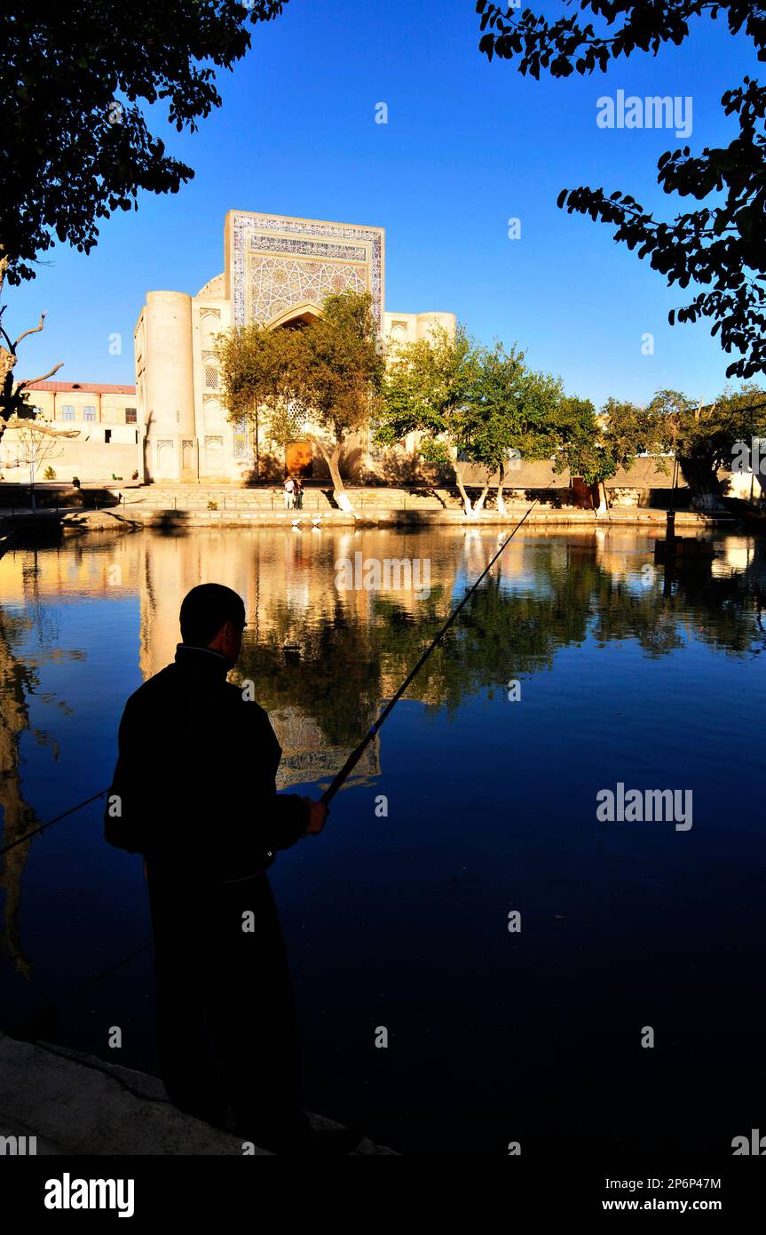 The Nodir Devonbegi Madrasah and the Divan-Beghi pond in the heart of ...