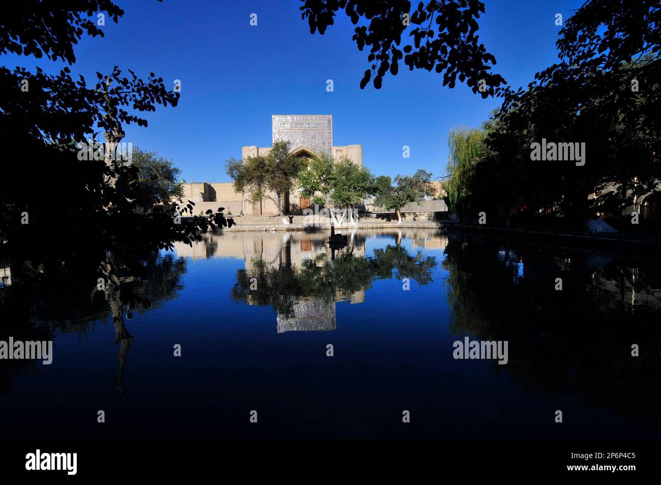 The Nodir Devonbegi Madrasah and the Divan-Beghi pond in the heart of ...