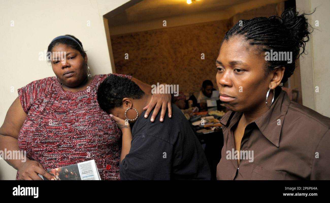 In this Thursday, Feb. 2, 2012 photo, family friend Shalonda Spicer ...