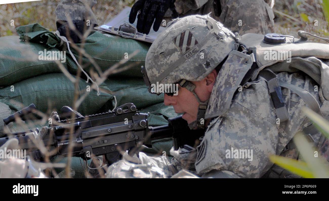 Soldiers testing for the Expert Infantryman Badge at Fort Stewart , Ga ...