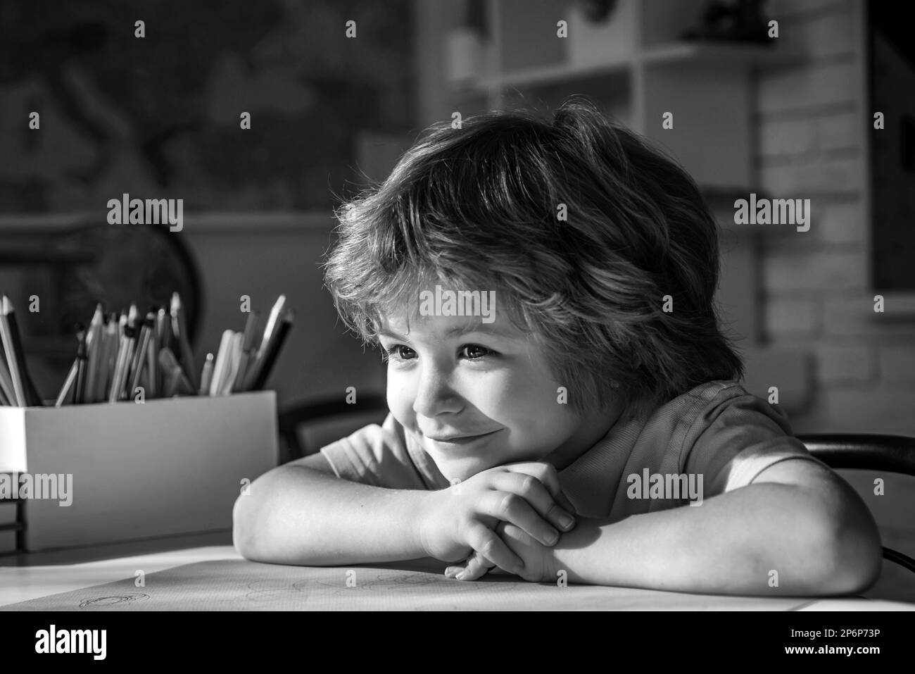 Cute face of pupil, close up. Pupil learning letters and numbers ...