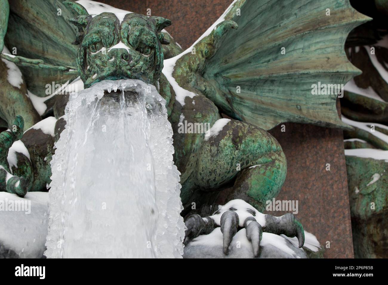 An iced gargoyle in a fountain in Zurich, Thursday Feb. 2, 2012. A cold ...