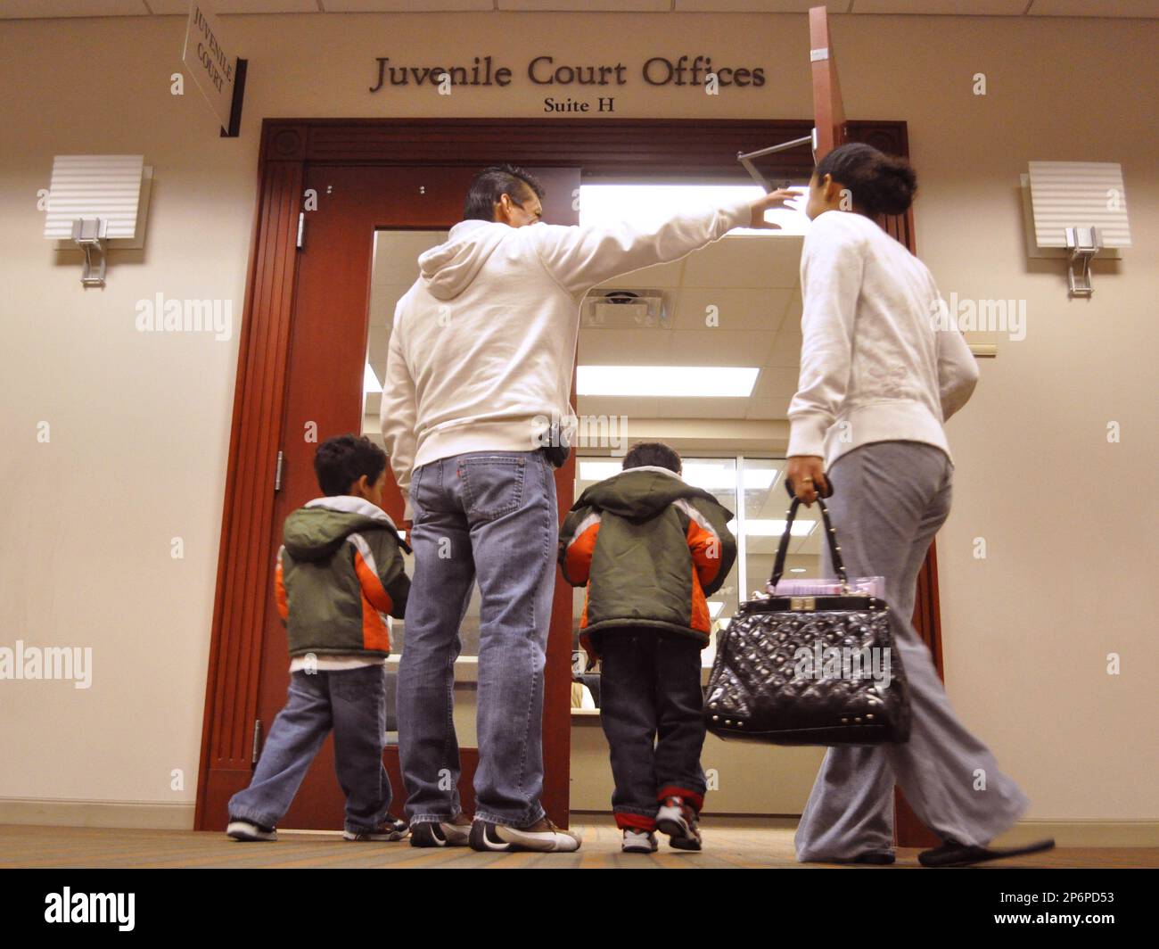In a Jan. 20, 2012 photo, a family enters into the Juvenile Court ...